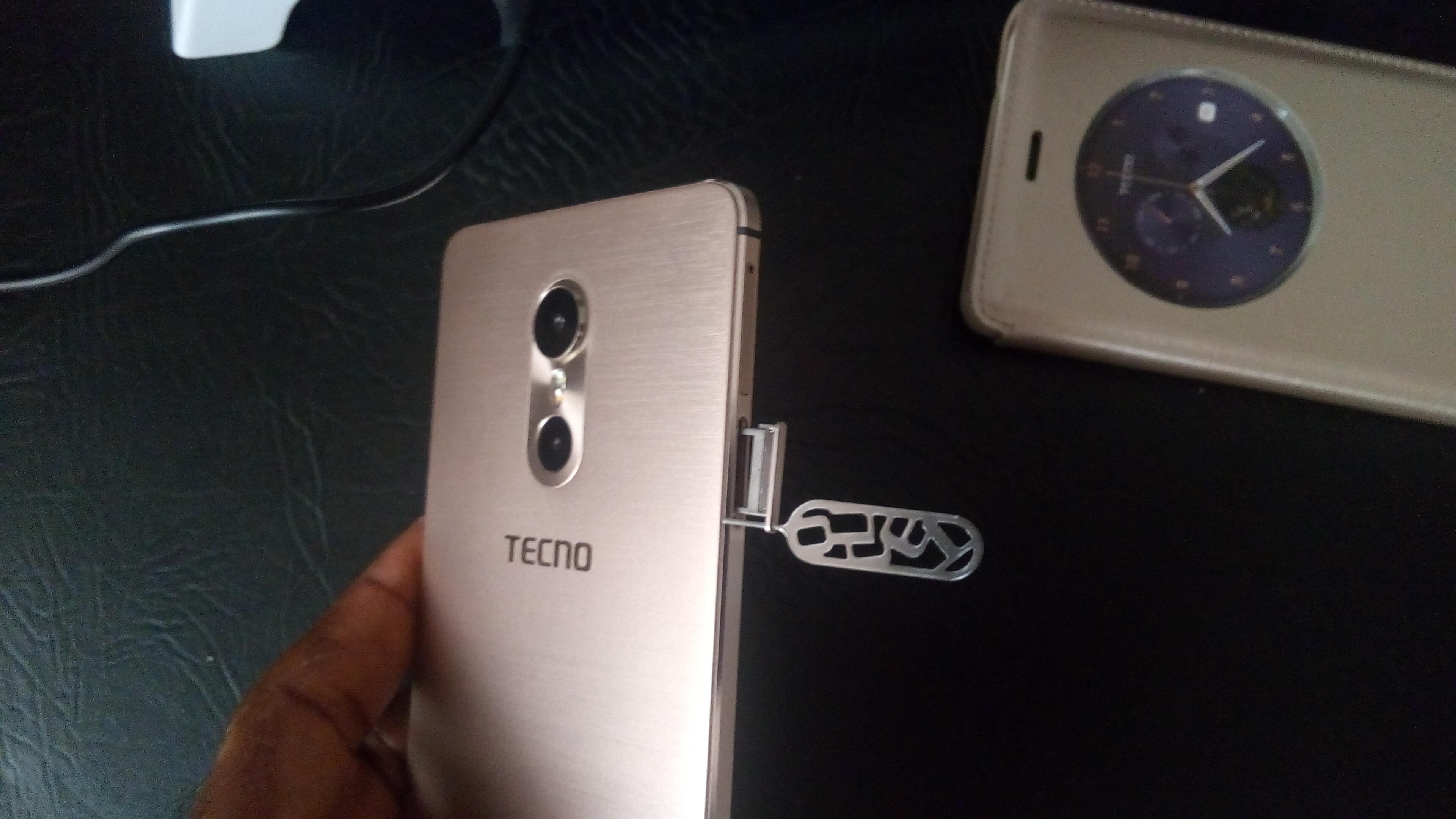 How to remove or insert SIM and SD memory cards on a Tecno Phantom 6 ...