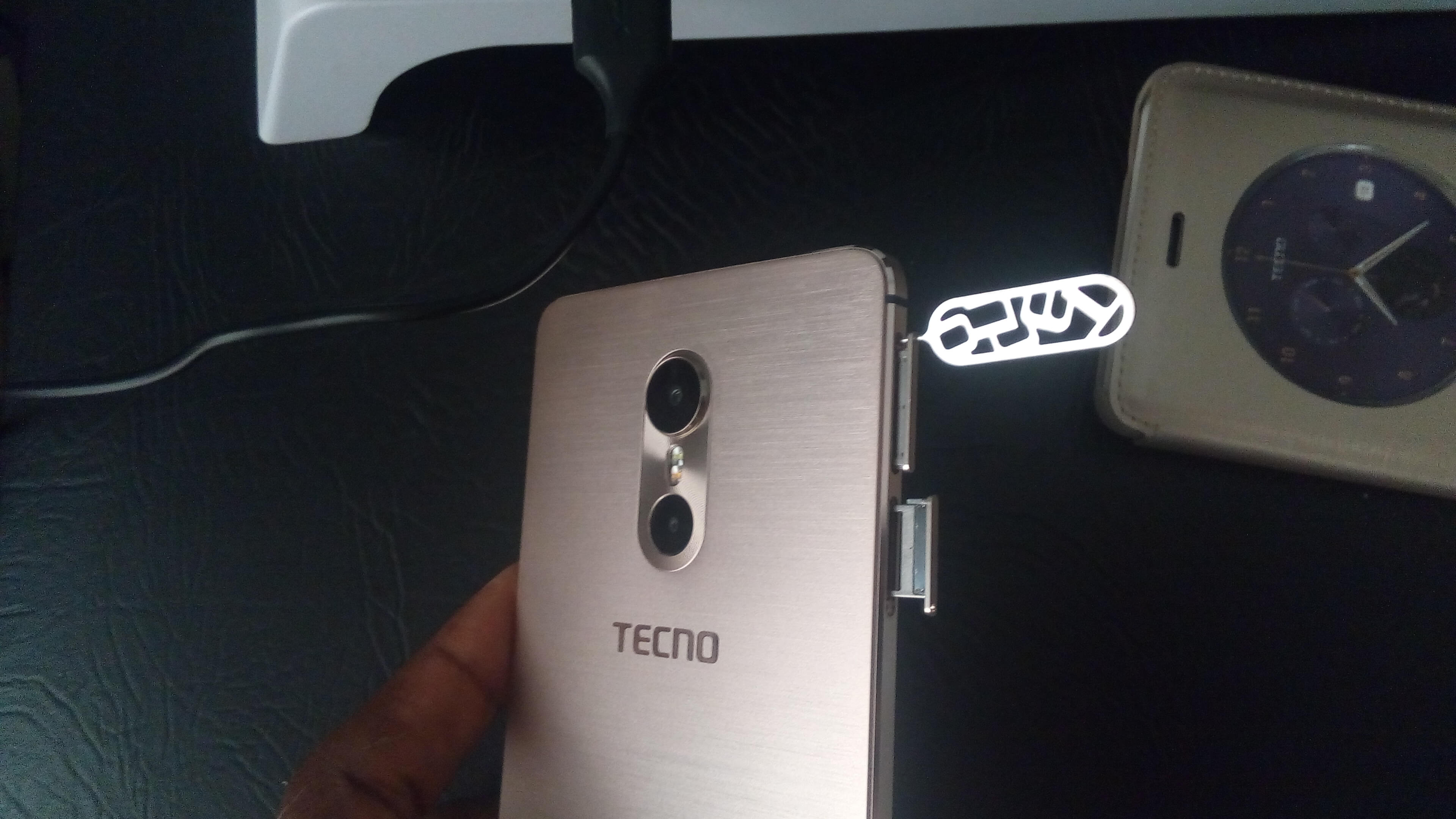 How to remove or insert SIM and SD memory cards on a Tecno Phantom 6 ...